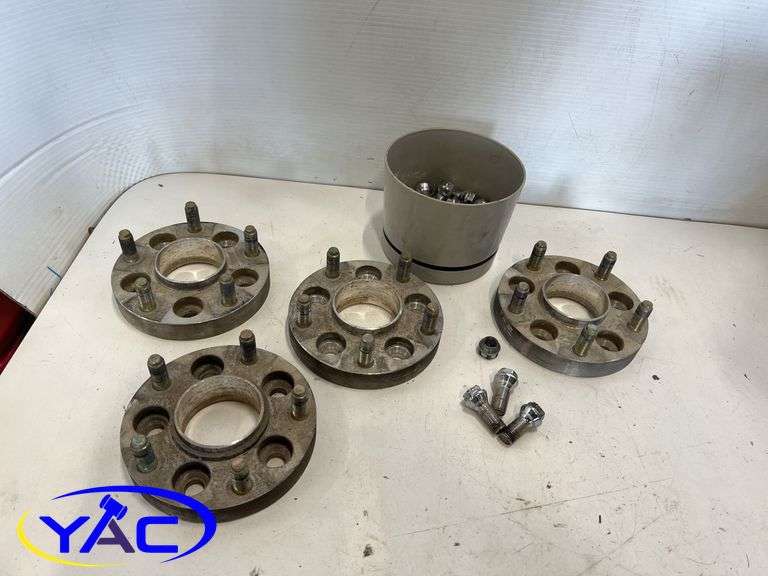 4 - Bolt On Bolt Spacing Adapters (Fit Audi) - YAC Auctions