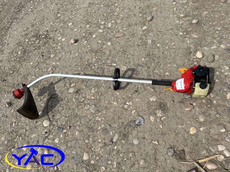 Homelite - Mighty 26CS Gas Powered Trimmer - YAC Auctions