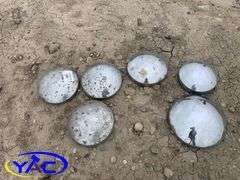 Chrome Baby Moon Hubcaps - YAC Auctions