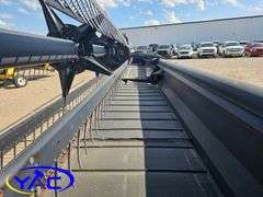 MACDON 960 36' HEADER W/ TRANSPORT - YAC Auctions