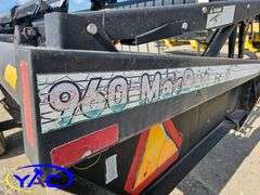 MACDON 960 36' HEADER W/ TRANSPORT - YAC Auctions