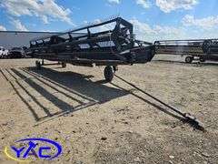 MACDON 960 36' HEADER W/ TRANSPORT - YAC Auctions