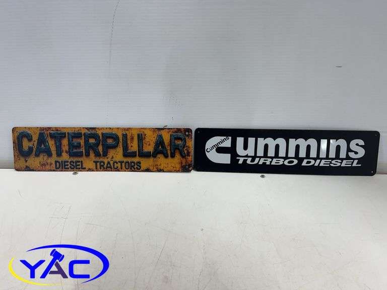 Cummins Sign and Caterpillar sign - YAC Auctions