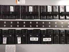 Eaton 150A Panelboard with Circuit Breakers - Yellow Tag Auctions