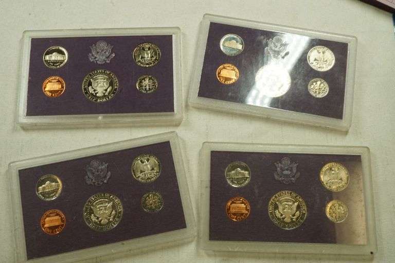 Lot of (4) US Coin Sets - Yellow Tag Auctions