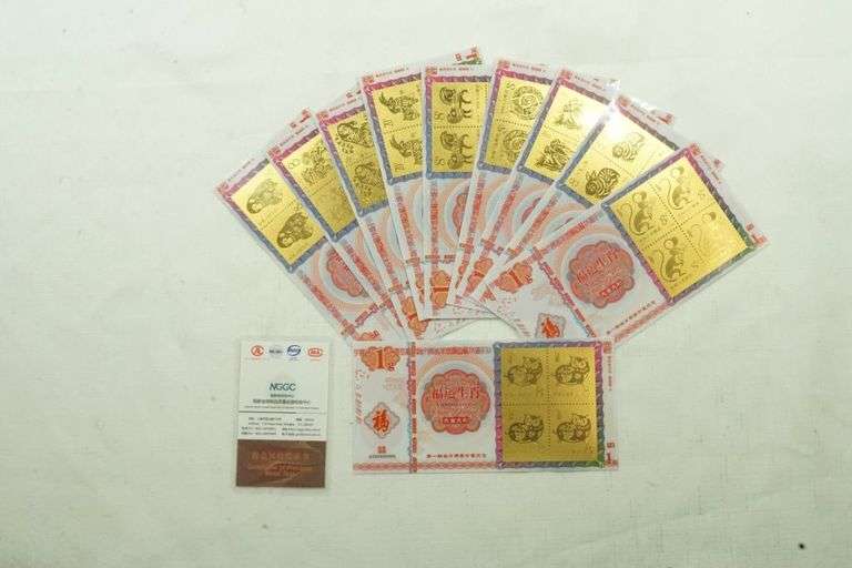 Lot of (11) Chinese Zodiac Gold Stamps - Yellow Tag Auctions